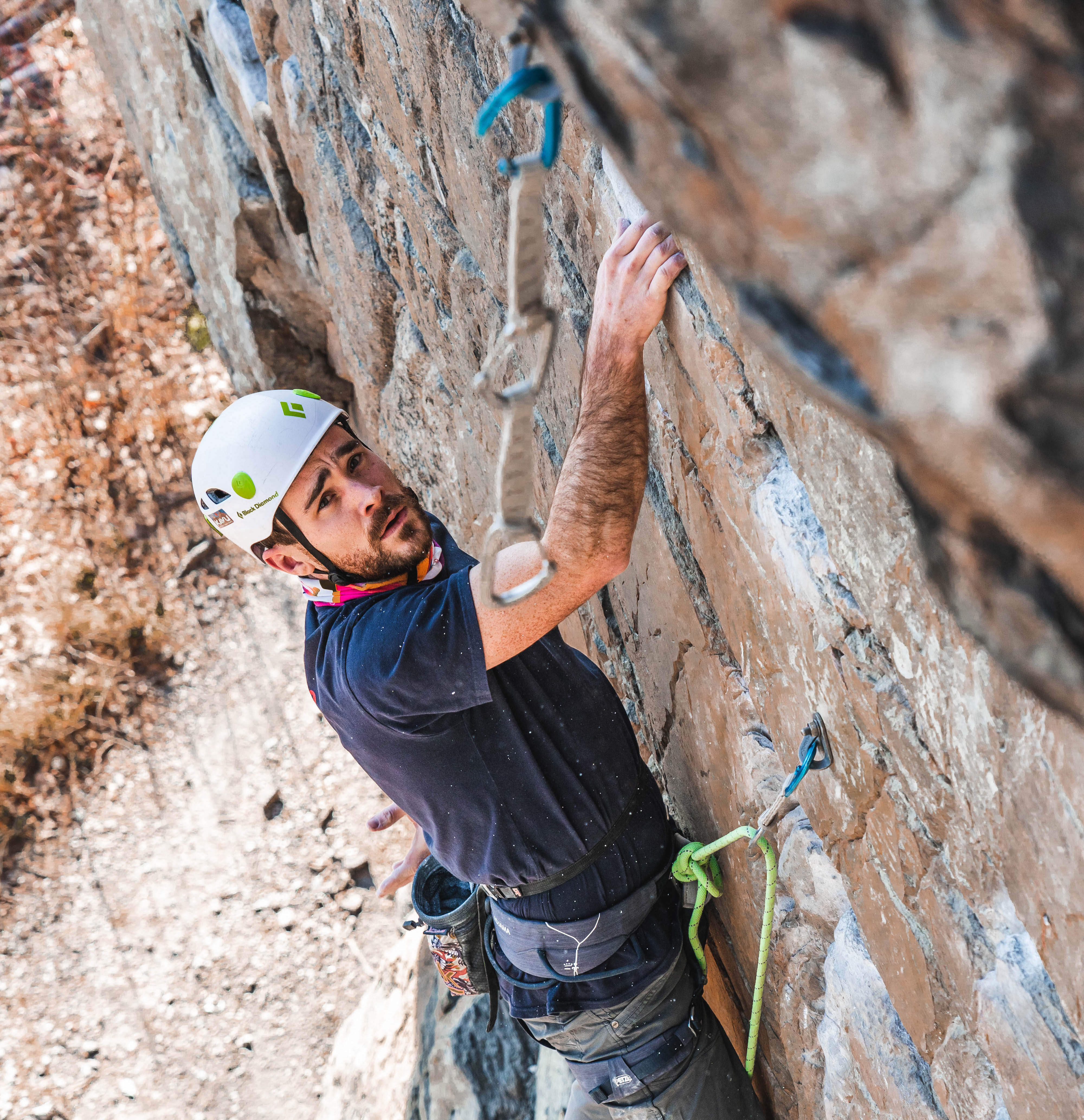 Kyle in thought climbing