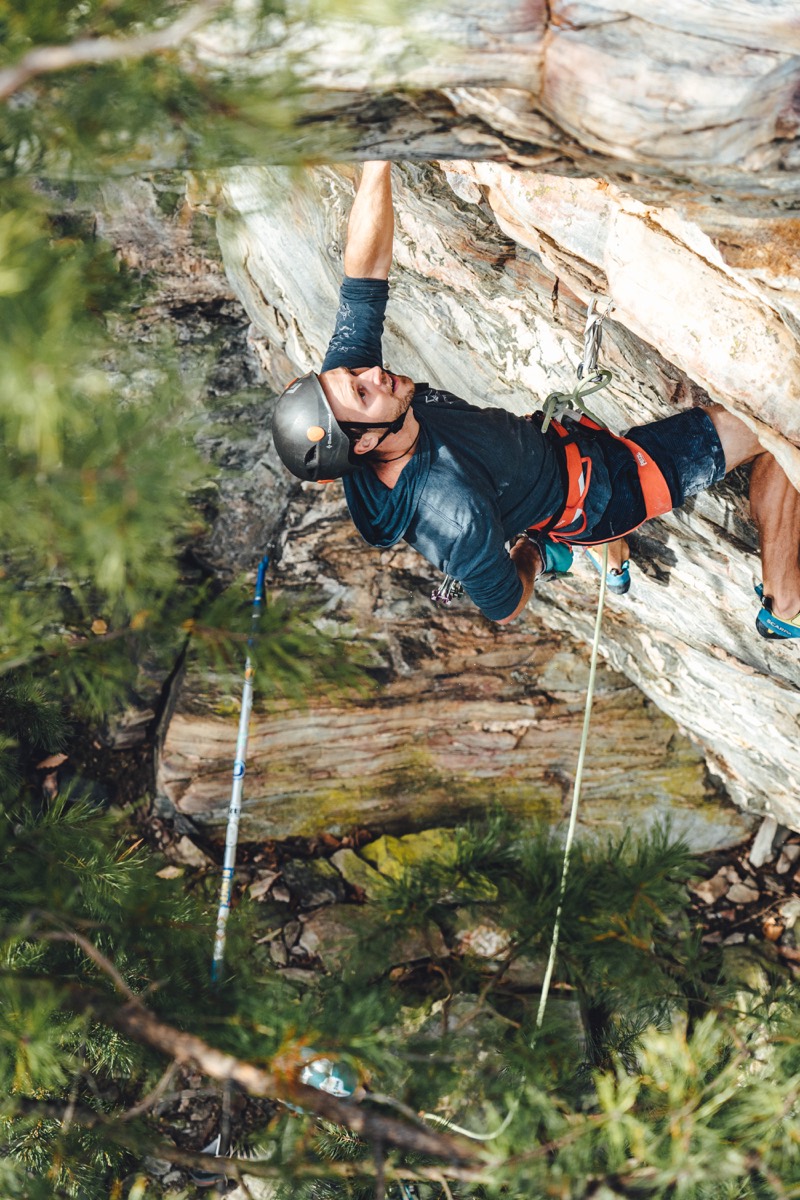 Climber chalking up